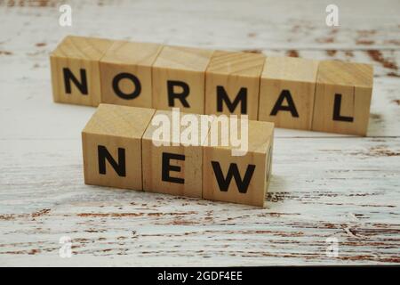 New Normal alphabet letters on wooden background Stock Photo - Alamy