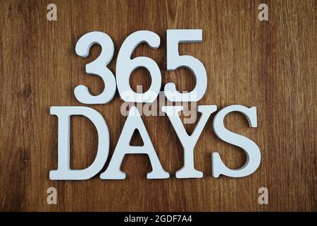 365 Days alphabet letters on wooden background Stock Photo - Alamy