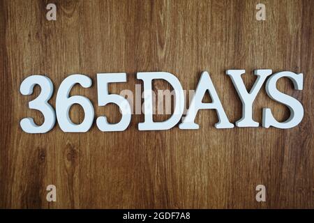 365 Days alphabet letters on wooden background Stock Photo - Alamy