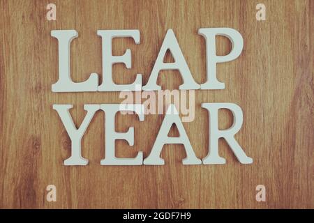 Leap Year alphabet letters on wooden background Stock Photo - Alamy