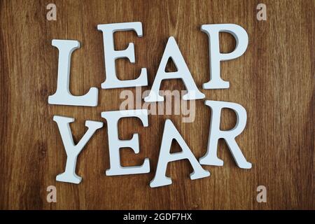 Leap Year alphabet letters on wooden background Stock Photo - Alamy