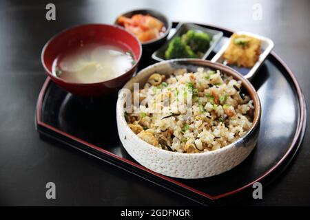 baked rice with scallop japanese food Stock Photo - Alamy