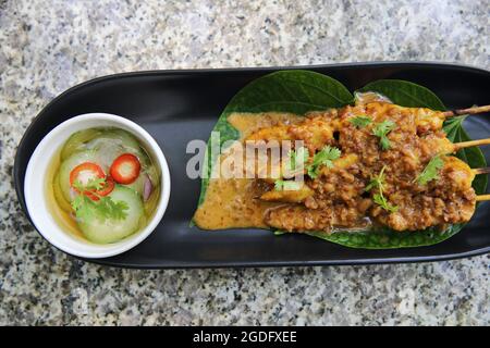 Chicken Satay in close up , Asian food Stock Photo - Alamy