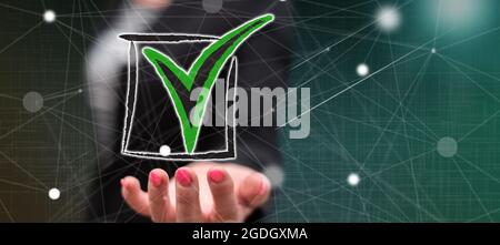 Validation concept above the hand of a woman in background Stock Photo ...