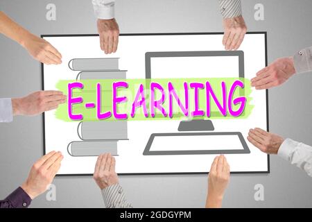 E-learning concept on a whiteboard held by hands Stock Photo - Alamy