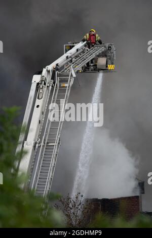 North Shields, UK, 13 August 2021. Firefighters fight large fire on ...