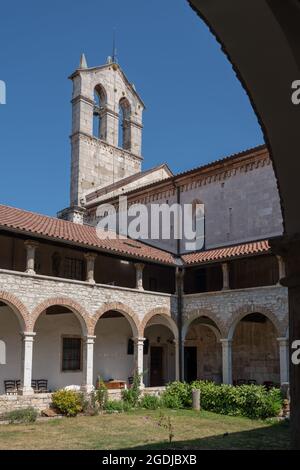 Cloistered courtyard of medieval St. Francis monastery in Pula, Croatia ...