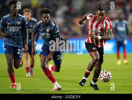 Brentford's Ivan Toney (right) and Arsenal's Kieran Tierney battle for ...