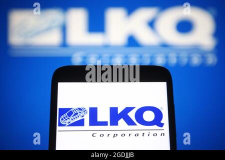 In this photo illustration a LKQ Corporation logo is seen on a ...