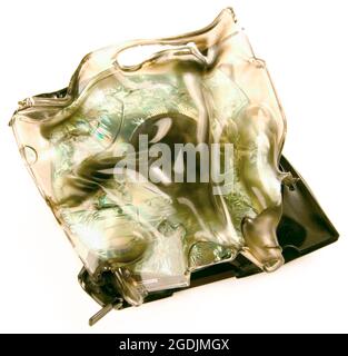 loss of data, melted CD with CD cover Stock Photo - Alamy