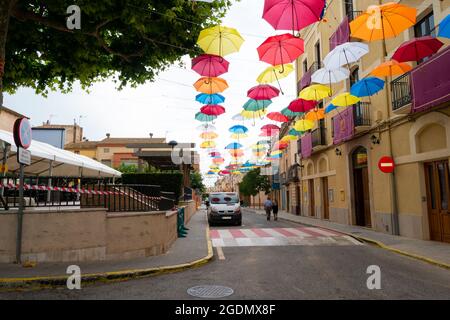 The Vila Rodona day, with the colorful umbrellas, flowers and old ...