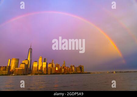 Rainbow Appears Over The Lower Manhattan Skyscraper NYC Stock Photo - Alamy