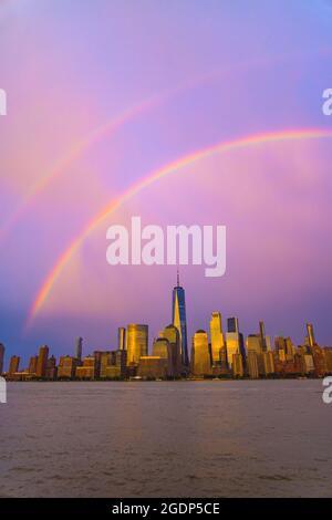 Rainbow Appears Over The Lower Manhattan Skyscraper NYC Stock Photo - Alamy