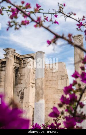 Purple bougainvillea flowers framing the colorful houses of Scilla ...