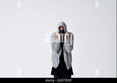 masked man with hood anonymity theft hacking Stock Photo - Alamy