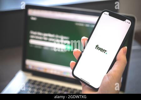 Kharkov, Ukraine - August 12, 2021: Cnn app. Woman using smartphone ...
