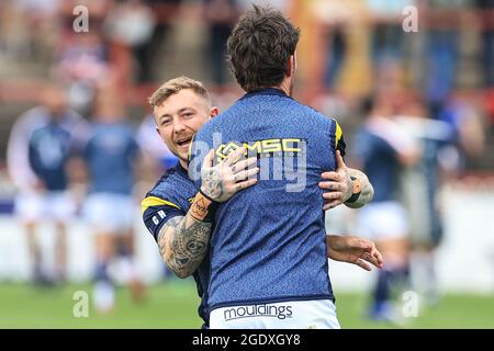 Josh Charnley (5) of Warrington Wolves and Stefan Ratchford (1) of ...