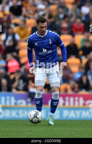BRADFORD, UK. AUGUST 14TH Oldham Athletic's Jordan Clarke tussles with ...