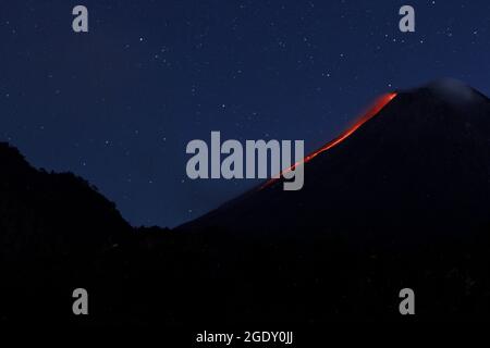 View of Mount Merapi from the village Cangkringan in its south Stock ...