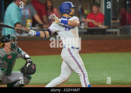 Texas Rangers first baseman Nathaniel Lowe (30) steps on first base to ...