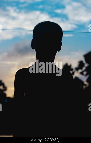 Portrait of a man enjoying the Sunset. Concept of Alone boy. Sunset ...