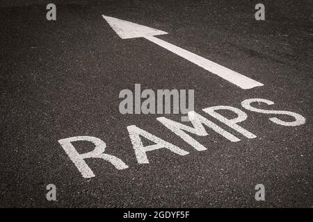 Ramp road sign pointing arrow Stock Photo - Alamy
