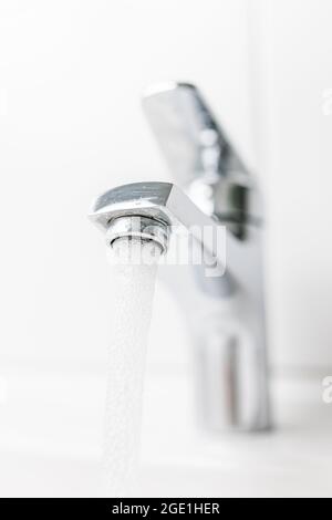 Freiburg, Germany. 09th Aug, 2021. Water runs out of a tap. Credit ...