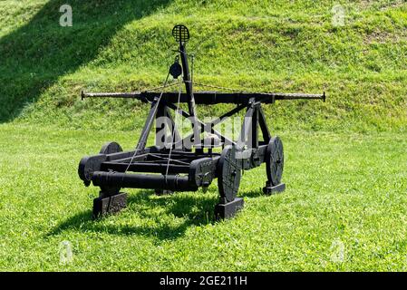 A Wooden Ballistic Device Of A Medieval Catapult. Ancient military Equipment in the castle of St ...