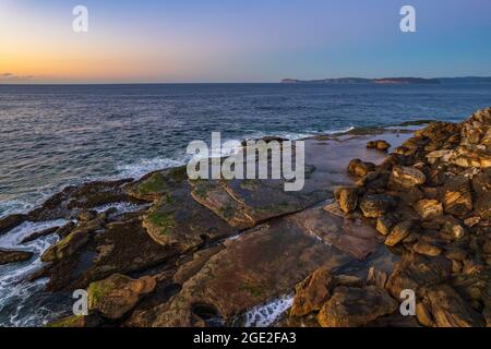 Fly over sunrise seascape at Killcare Beach on the Central Coast, NSW ...