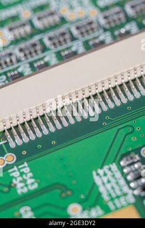 Close up shot of the soldered connections of a ribbon cable connector ...