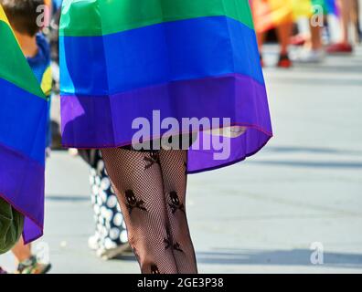 girl woman wearing fishnet tights and waistcoat and shirt as part of a ...