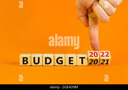 2022 budget new year symbol. Words '2022 budget' appearing behind torn ...