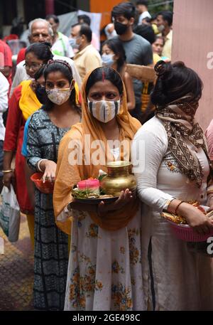 August 16, 2021, Guwahati, Guwahati, India: Hindu devotees queue to ...
