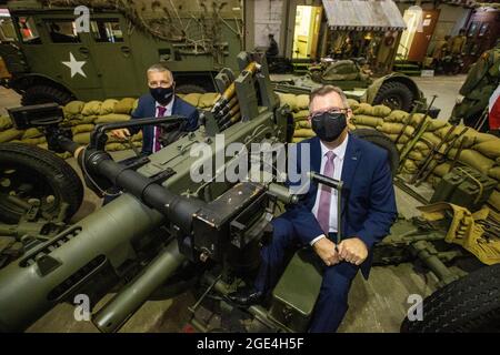 Leader of the DUP Sir Jeffrey Mark Donaldson MP (left) looks at ...