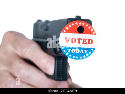 Concept for election violence with handgun decorated with I voted today ...
