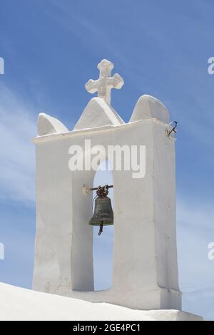 A vertical low angle shot of beautiful skyscrapers against a blue sky ...