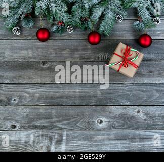 Evergreen tree giftbox on wooden board holiday concept Stock Photo - Alamy