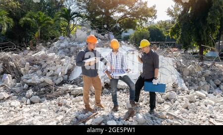 Demolition control supervisor and contractor discussing on demolish ...