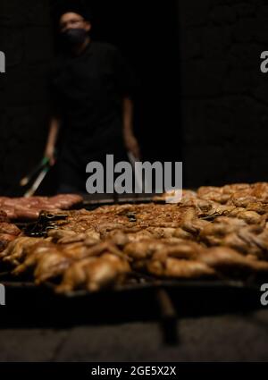 Grilling meat at a volcano Stock Photo - Alamy