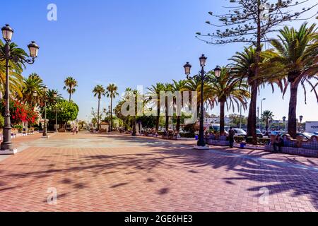 Ayamonte Paseo de la Ribera, a beautiful palm tree trees lined square ...