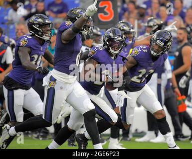 Baltimore Ravens safety Geno Stone (26) intercepts a pass during the ...