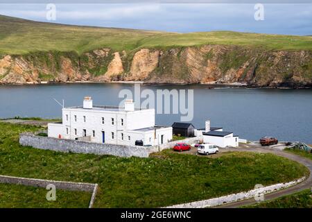 Old lighthouse shore station at Hermaness National Nature Reserve on ...