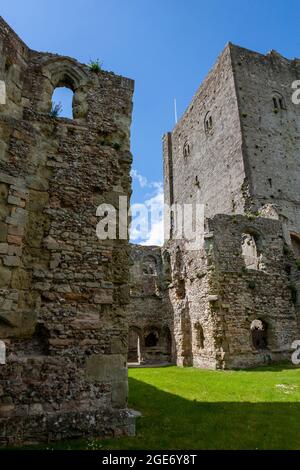The Norman keep of Portchester Castle seen at sunset in winter from ...