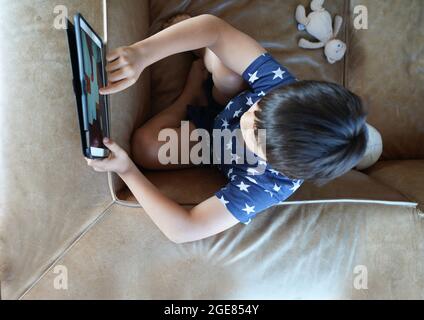 tween on tablet Stock Photo - Alamy