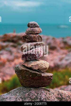 Colorful rock formation around picturesque small town Gudhjem in ...
