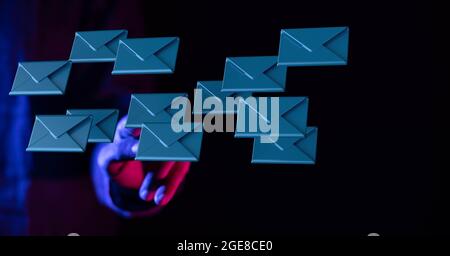 Person presenting the virtual projection of many letter envelopes Stock ...
