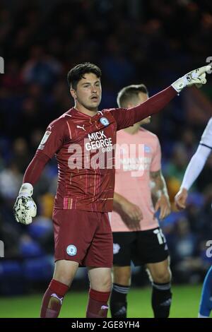 Peterborough, UK. 17th Aug, 2021. Aden Flint (CC) scores the first Cardiff goal (2-1) at the ...