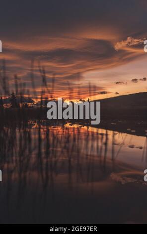 Amazing sunset at Pukaki lake in New Zealand south island Stock Photo ...
