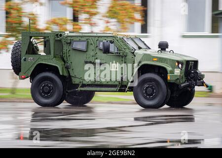 A Joint Light Tactical Vehicle (JLTV) with the troop seat kit installed ...