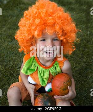 Cheerful boy on an autumnal farm Stock Photo - Alamy